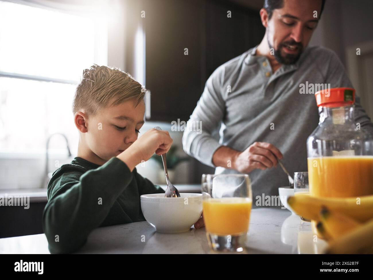 Talking, breakfast and father with child in kitchen for nutrition ...