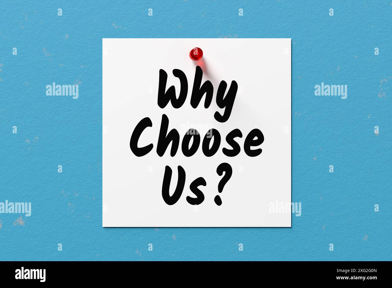 The message why choose us written on a note paper pinned on a blue ...