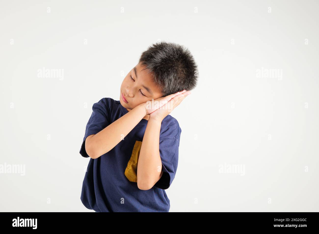 Portrait Asian young kid boy pretended emotions sleeping tired eyes ...