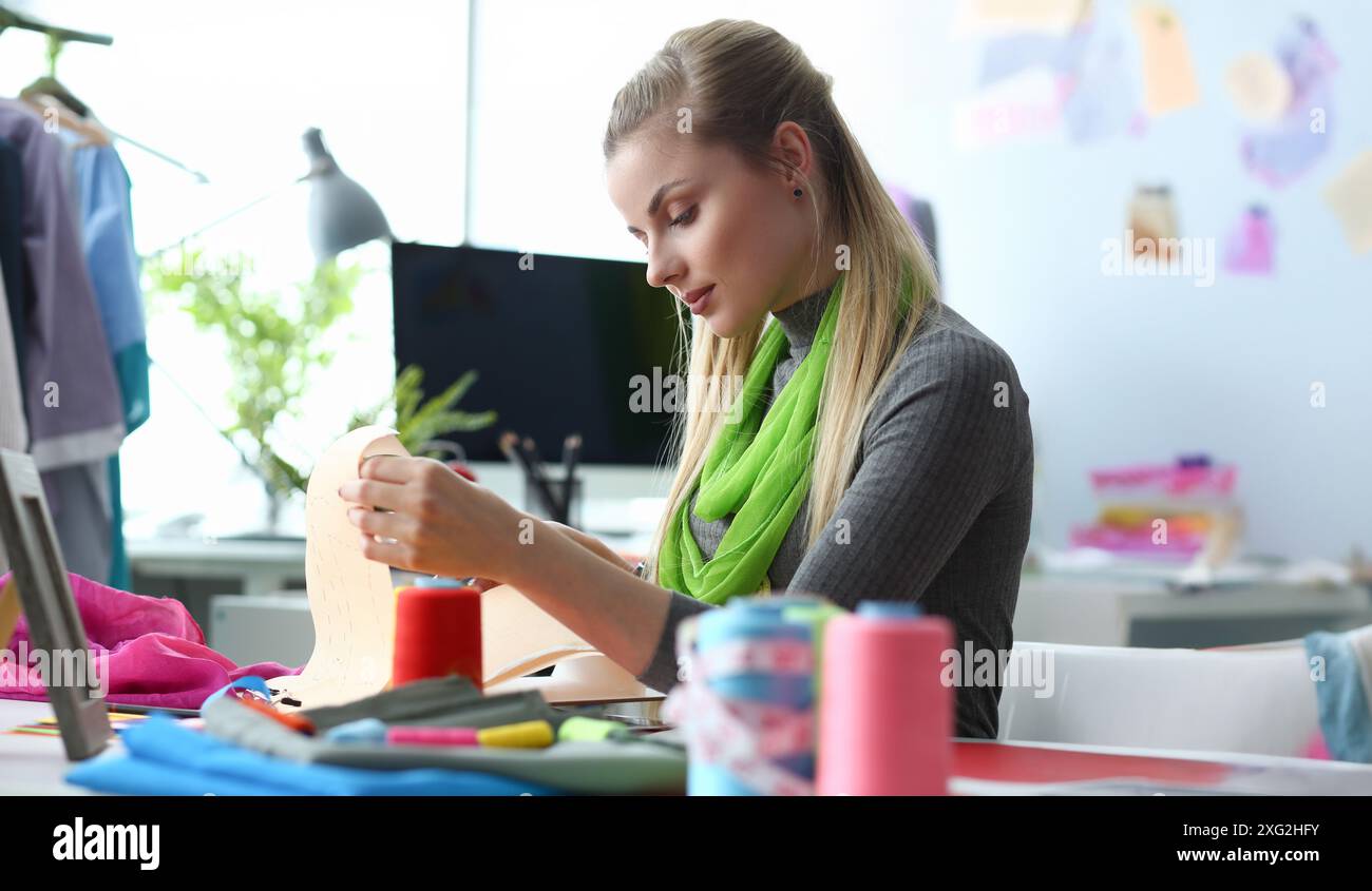 Talented lady have ideas for collection, album full with sketches ...