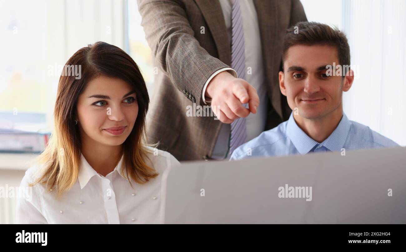 Team work on desktop computer, boss point on screen, this one, perfect ...