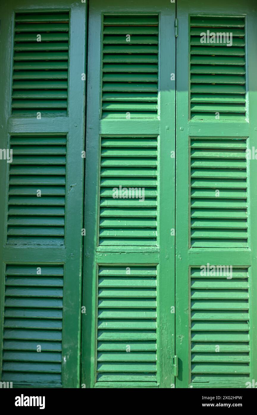 old green shutters in a house in the village Stock Photo - Alamy