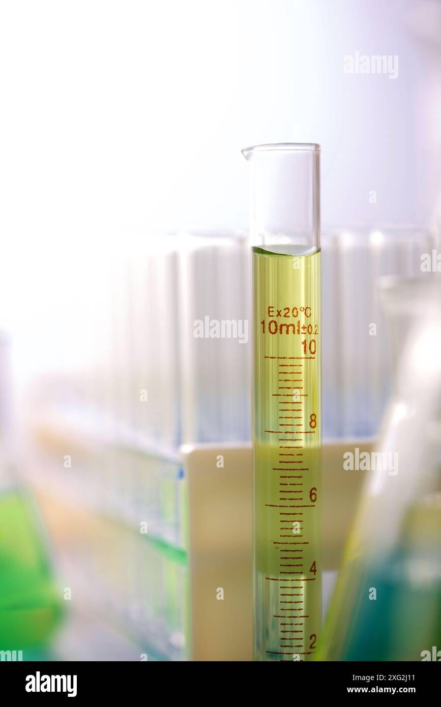 Close up of test-tube glass beaker with liquid standing on a laboratory ...