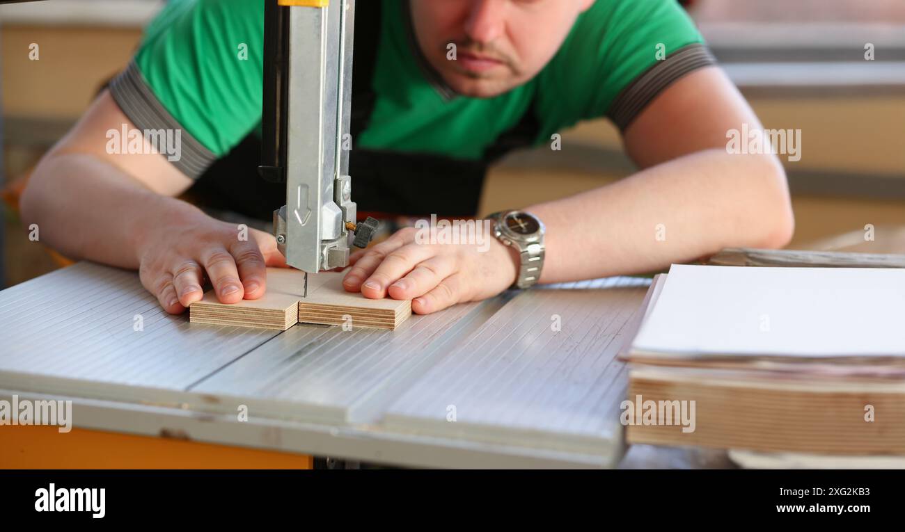 Worker using electric saw, handyman on workplace, diy Stock Photo - Alamy