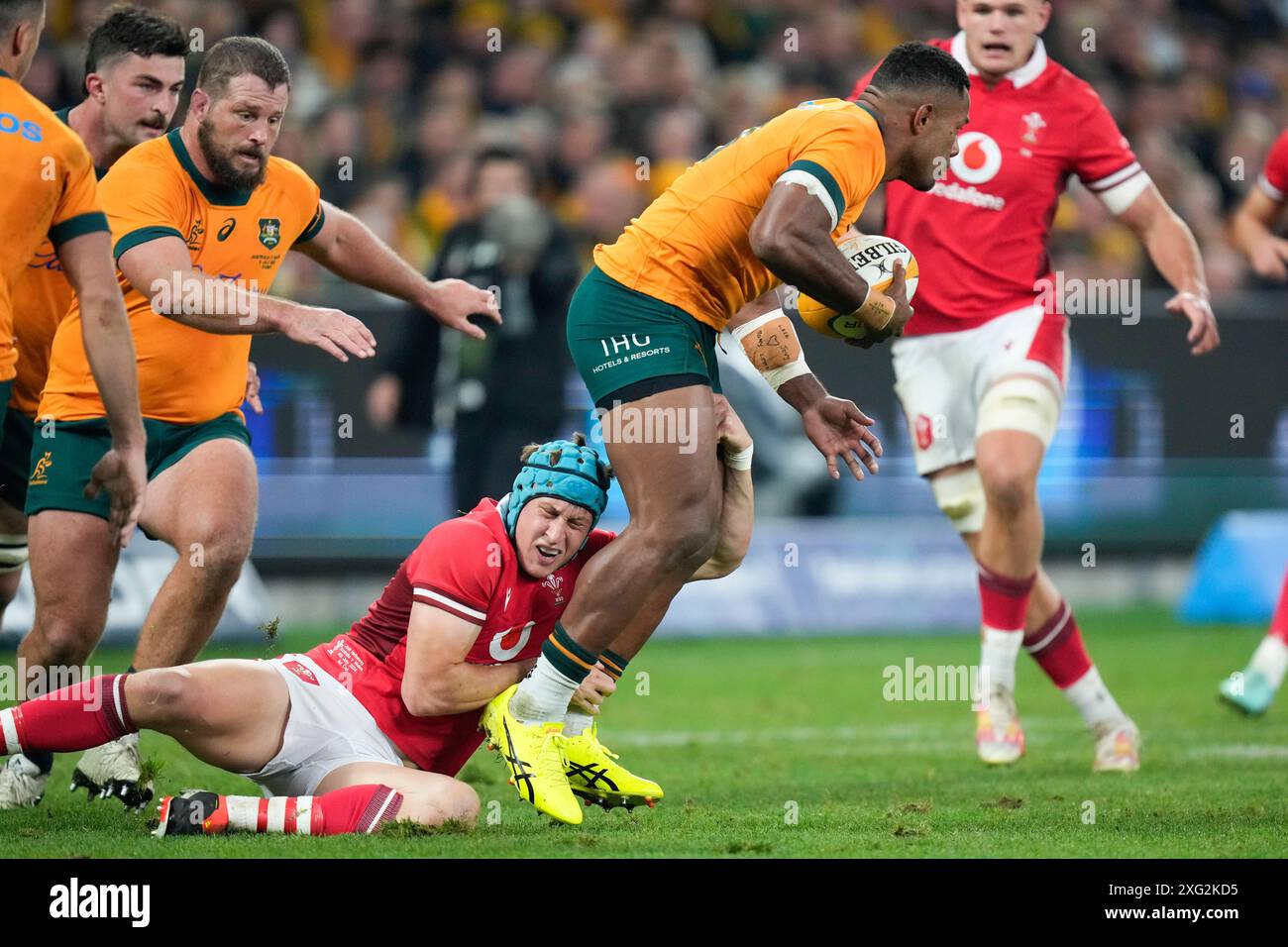Wales winger Josh Hathaway tackles Australia's Filipo Daugunu during ...