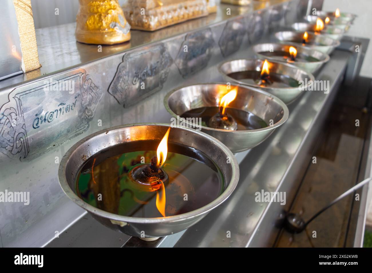 Buddhist oil lamps hi-res stock photography and images - Alamy