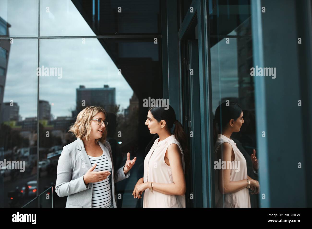 Office, balcony and business people with discussion, planning and ...