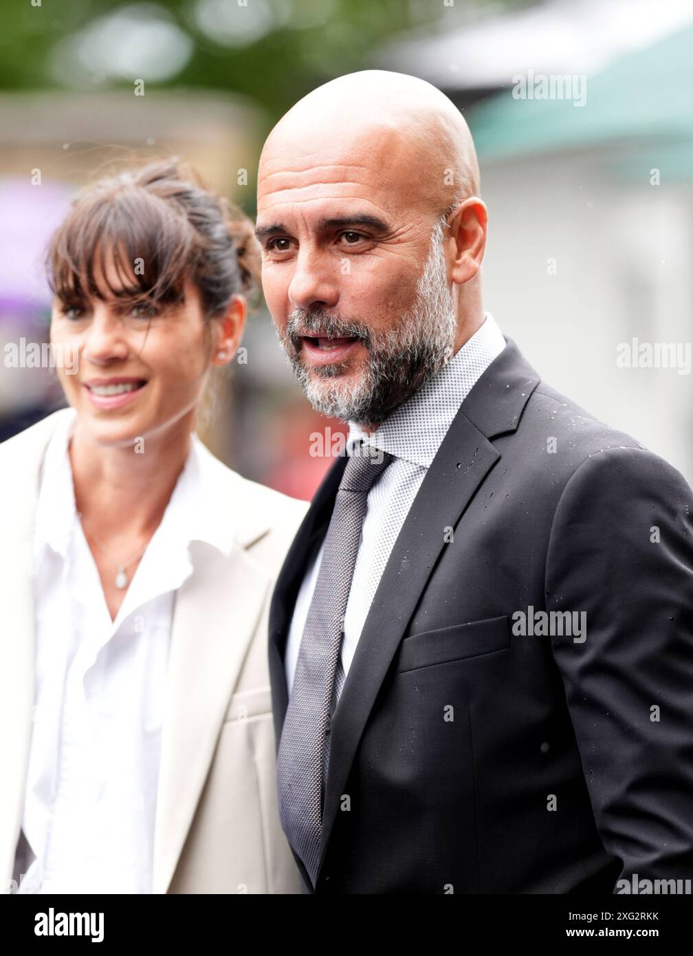 Manchester City manager Pep Guardiola with his wife Cristina Serra on day six of the 2024 ...