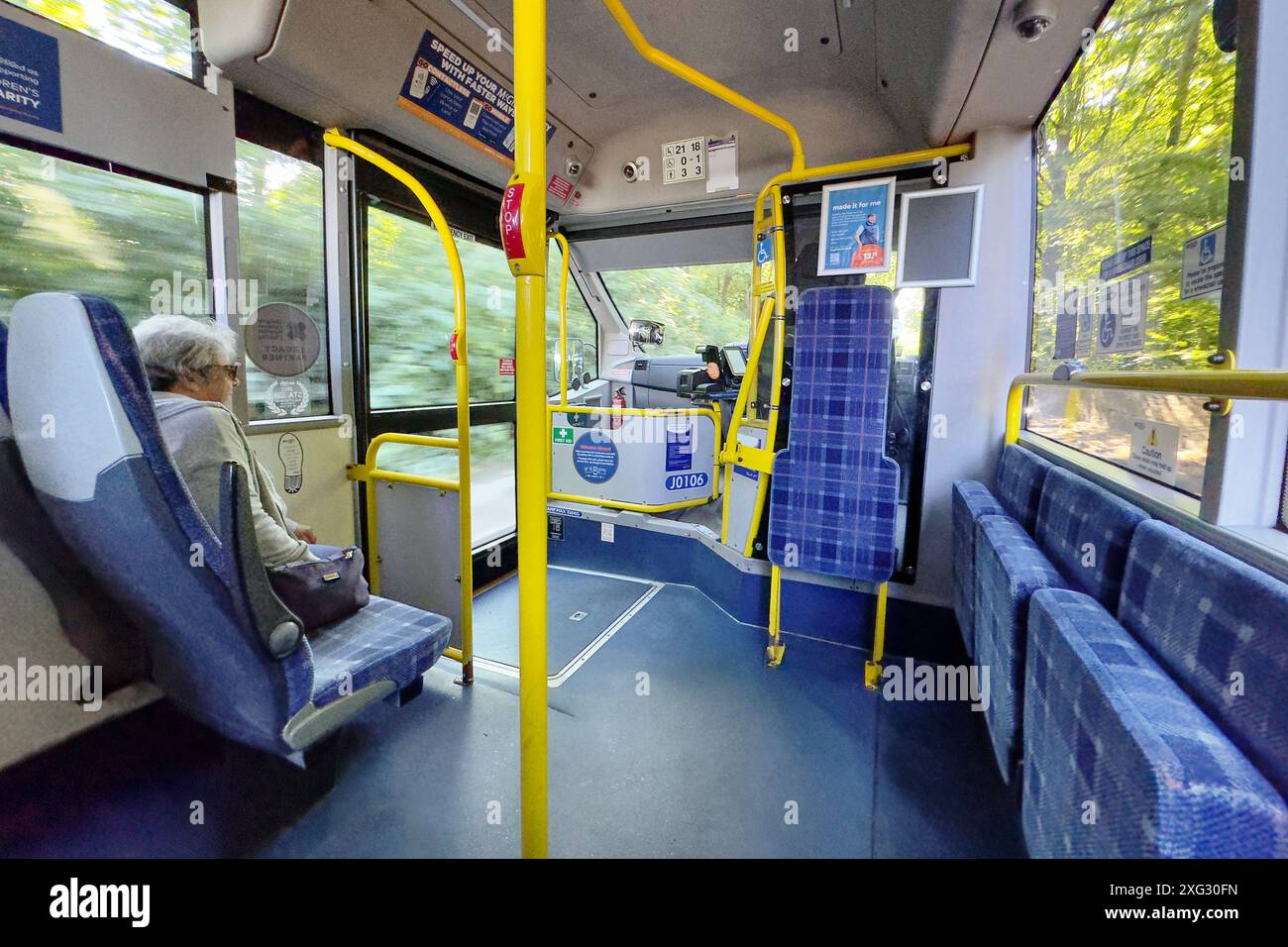 Elderly passenger on bus, service is free to the elderly in Scotland ...