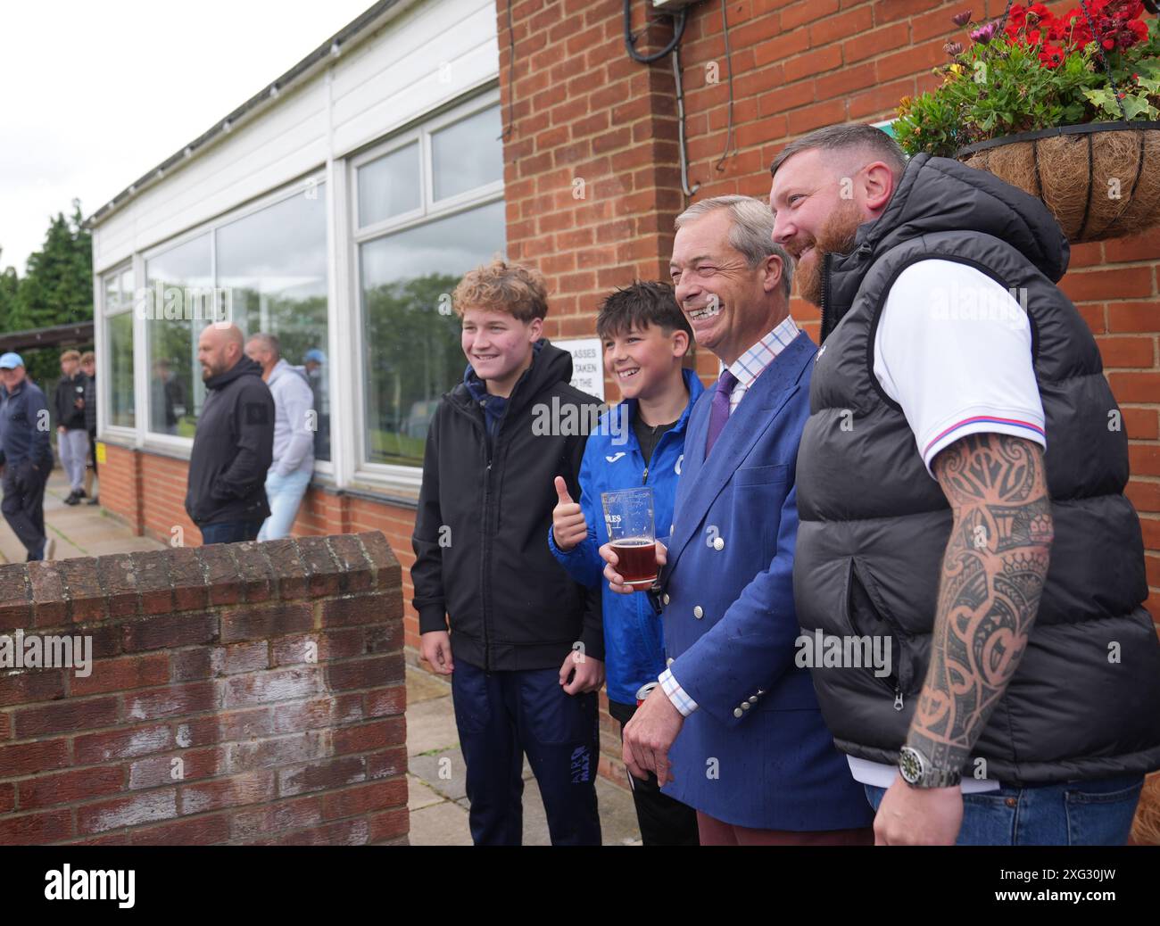 Reform UK leader Nigel Farage during a visit to Wyldecrest Sports ...