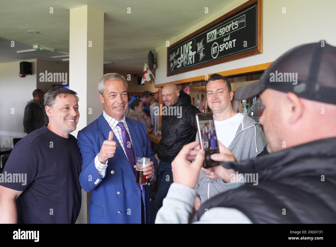 Reform UK leader Nigel Farage during a visit to Wyldecrest Sports ...