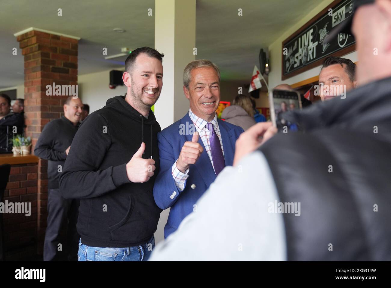 Reform UK leader Nigel Farage during a visit to Wyldecrest Sports ...