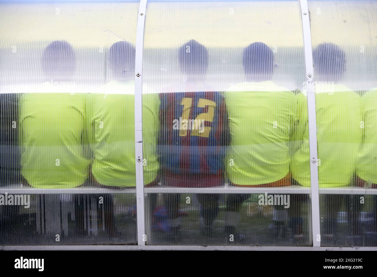 Reserves in the bench. Football players Stock Photo - Alamy