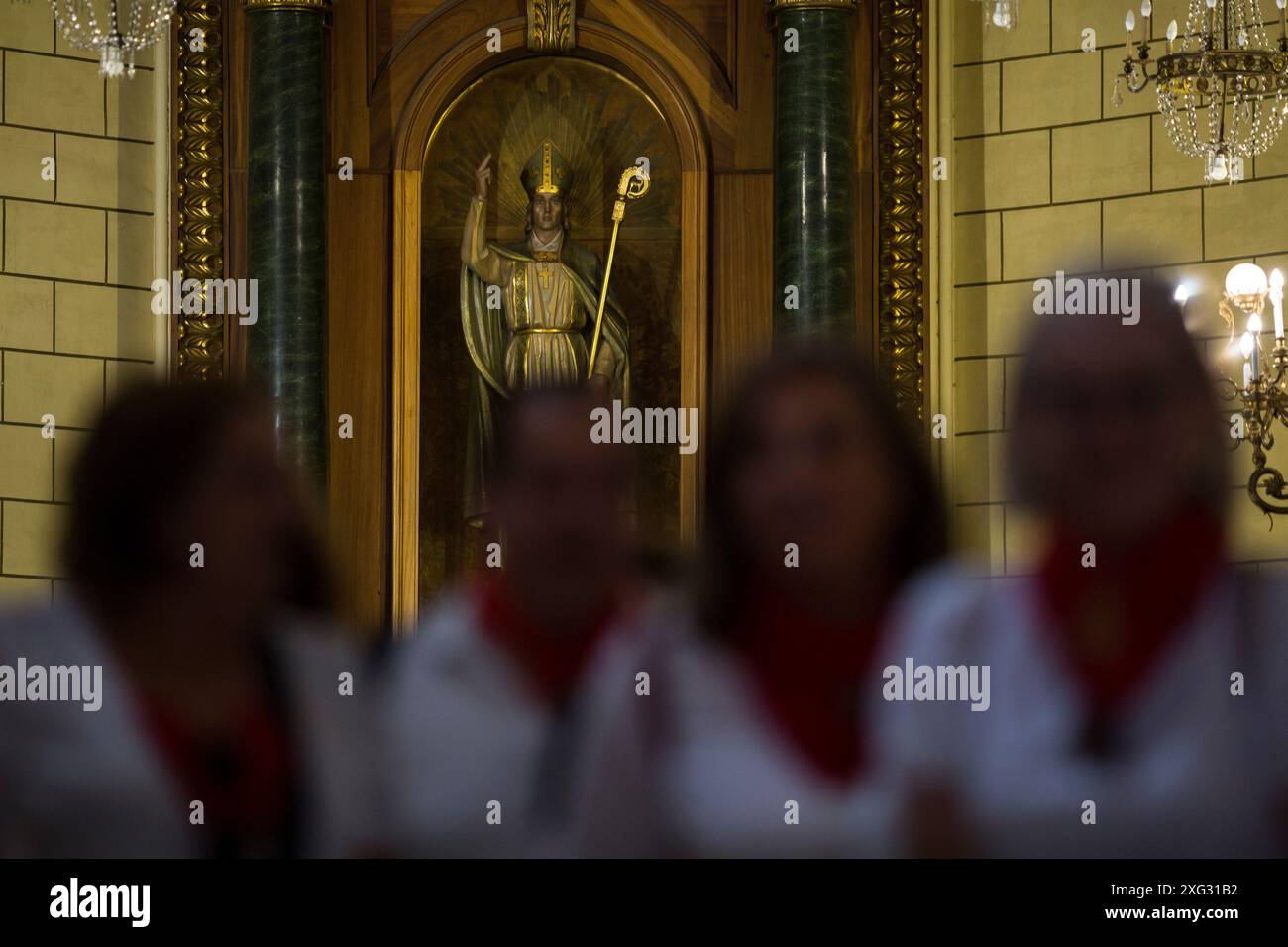 Madrid, Madrid, Spain. 6th July, 2024. People with red scarves around their necks leave the ...