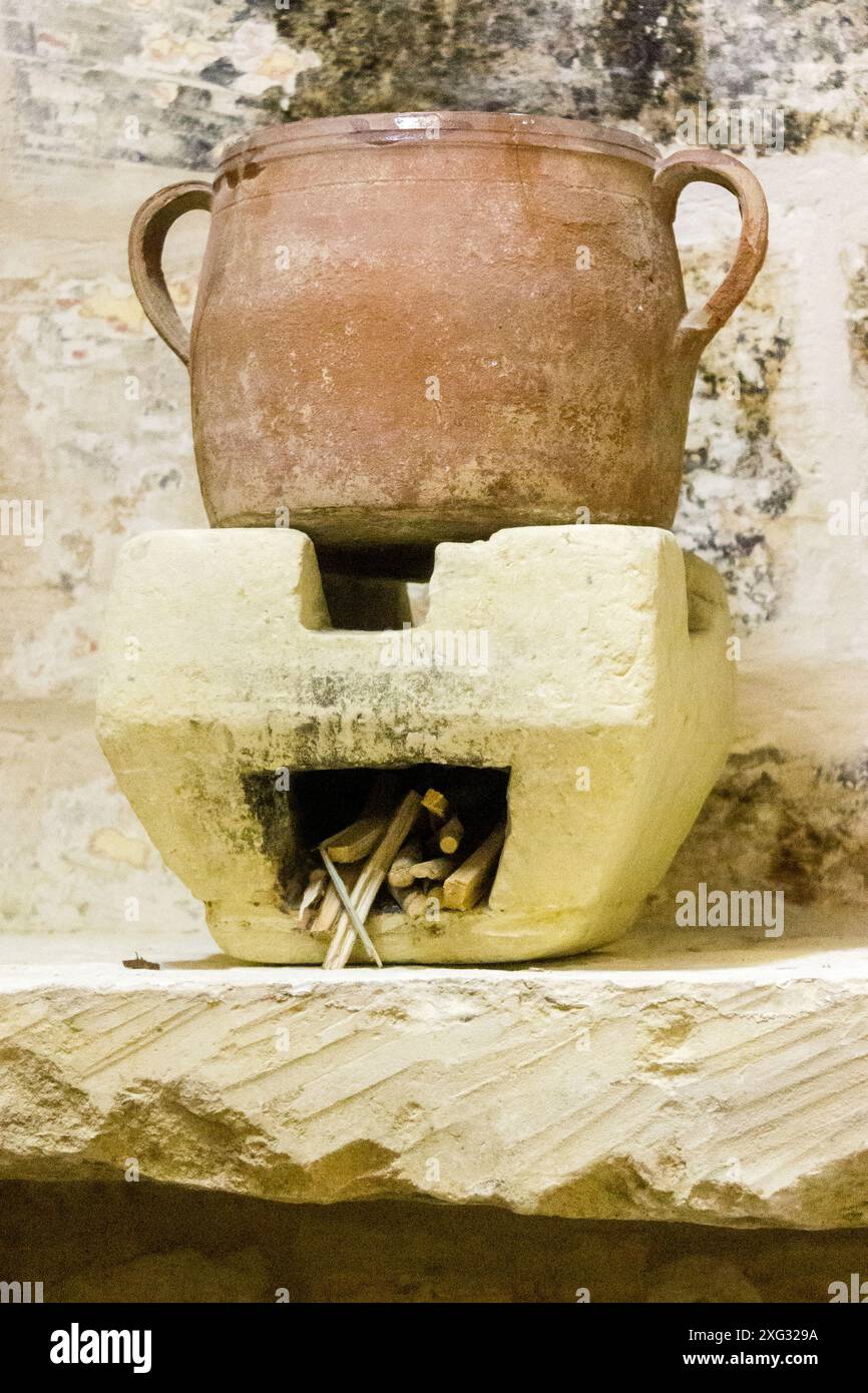 an old pottery soup pot on a Firestone stove with a wood fire Stock ...