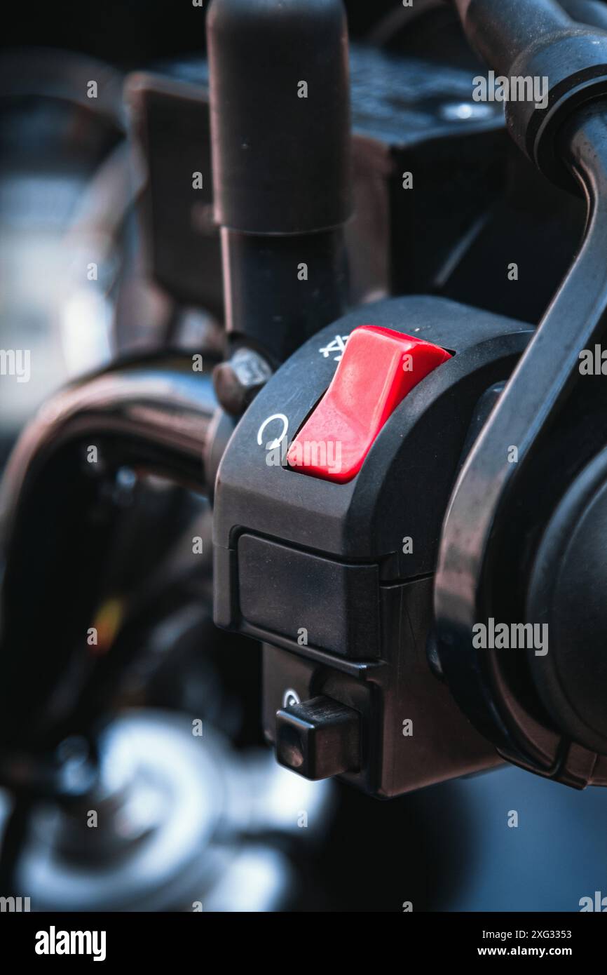 Red ignition button on motorcycle close-up, macro ignition lever Stock ...