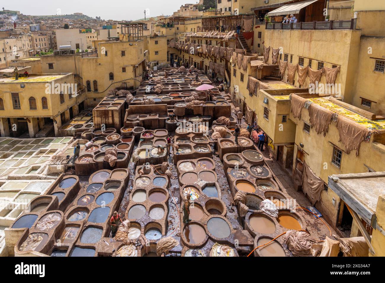 Fes, Morocco - March 23, 2024: A traditional leather tannery with dye ...