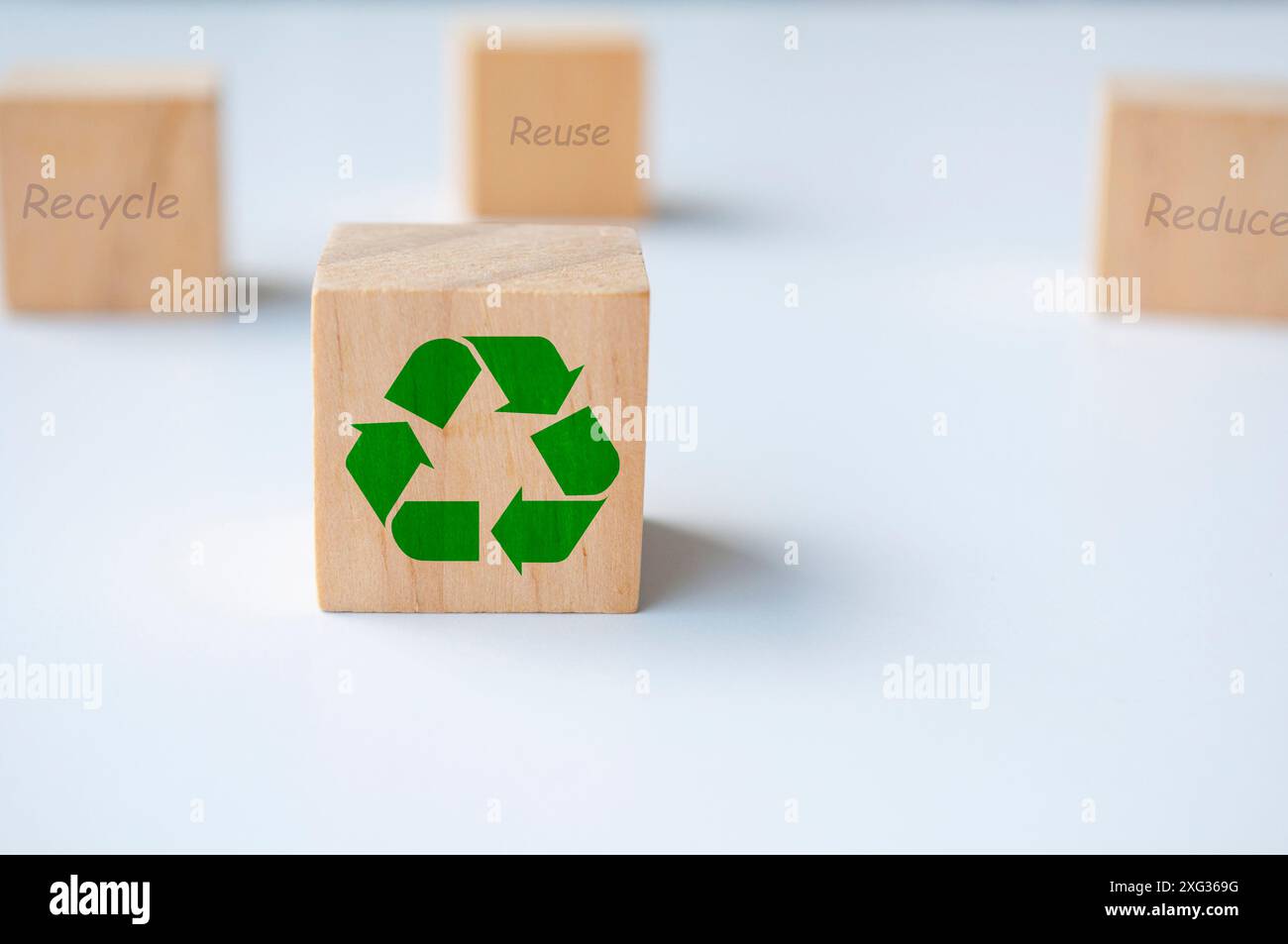 Focus on recycle symbol on wooden cubes with white background Stock ...