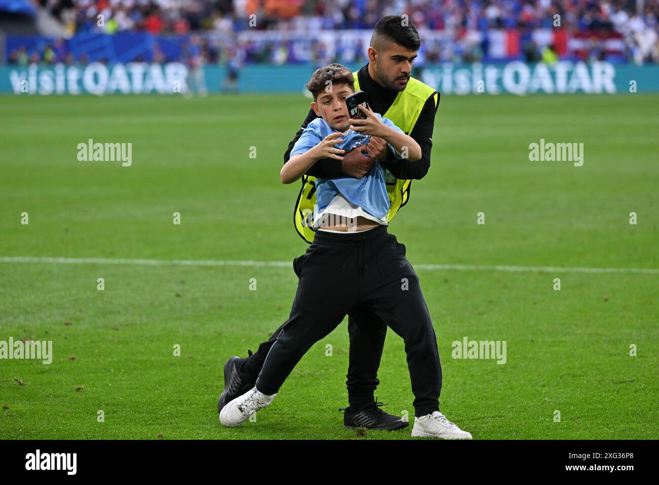 a young fan of Manchester City , pitch invader, streaker wants to take ...