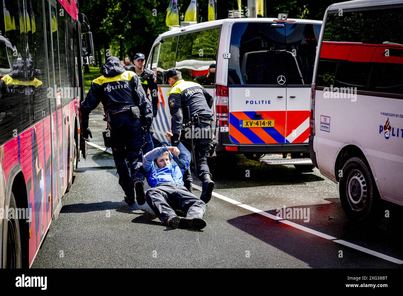 THE HAGUE - Protesters from Extinction Rebellion (XR) block the ...