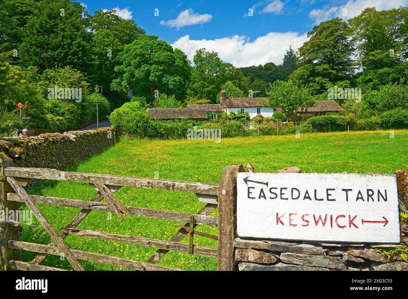White farm building Grasmere village in the Lake District National Park ...