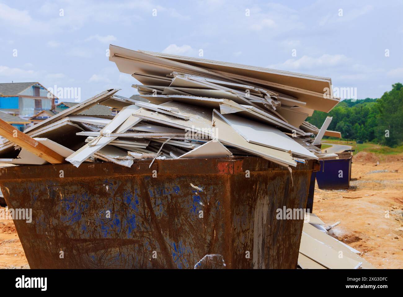 Container for construction waste was filled with remaining plasterboard ...