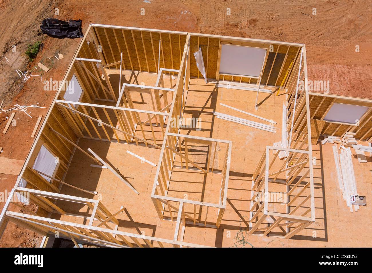 New unfinished residential home under construction framing of wood ...