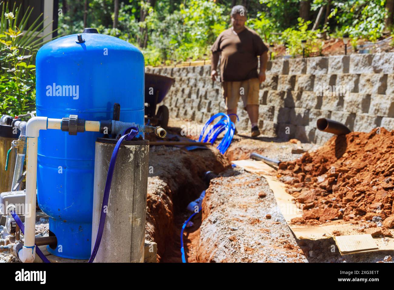 PVC pipe in trench is ready for connection to well water system at home ...