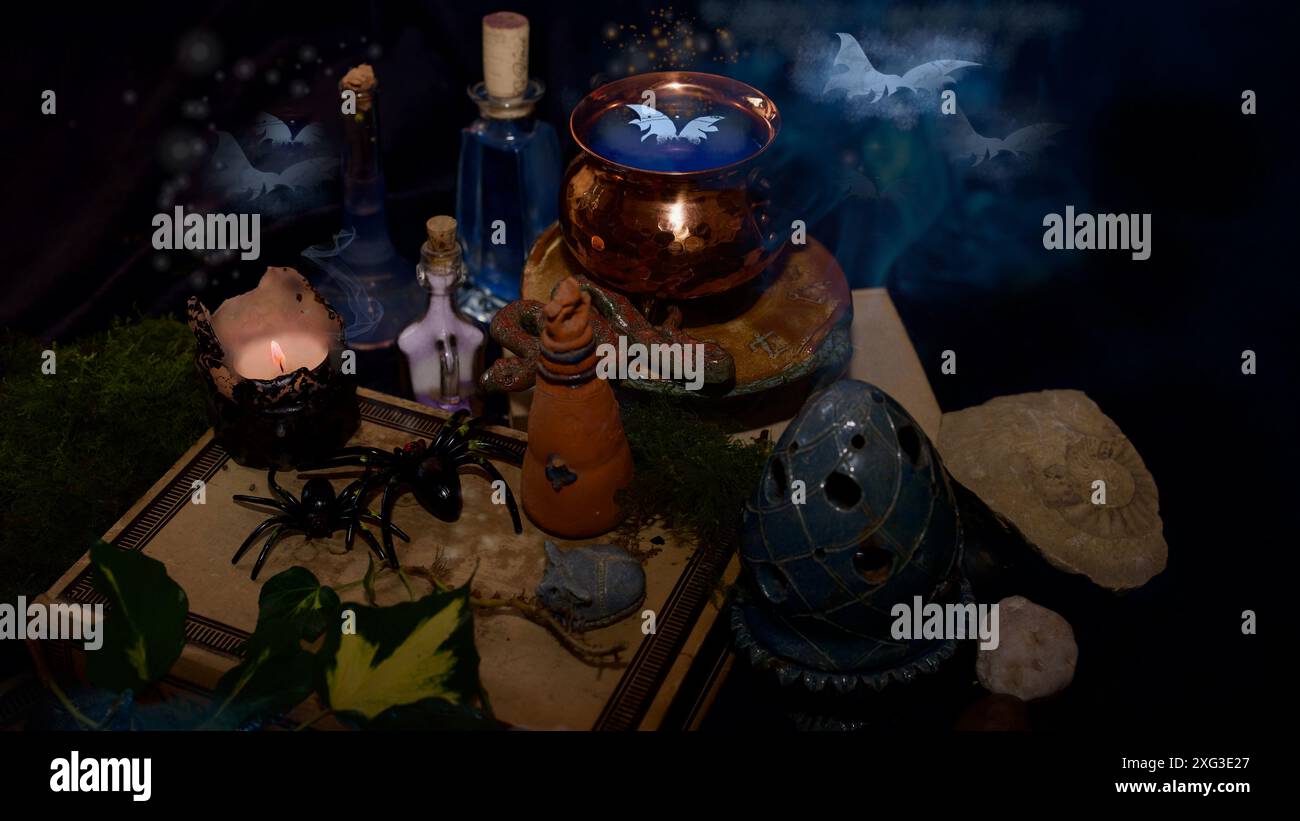 Winged creatures emerge from a cauldron Stock Photo - Alamy