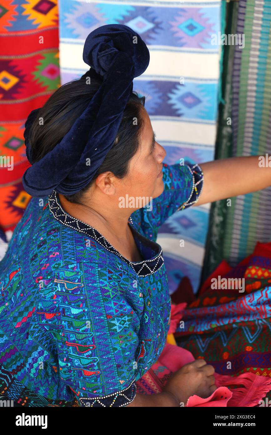 Indigenous Guatemalan lady selling her colourful hand woven wares by ...