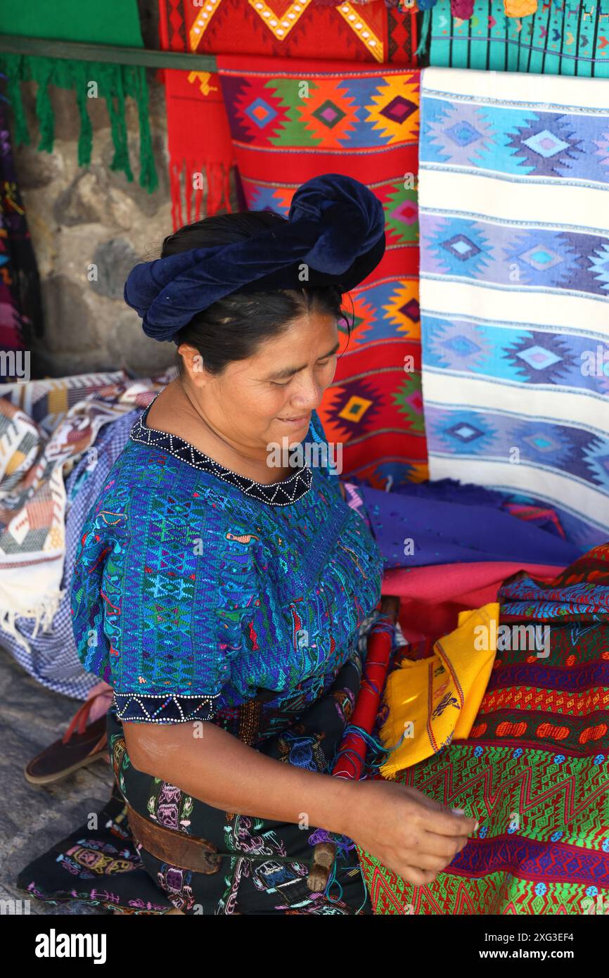 Indigenous Guatemalan lady selling her colourful hand woven wares by ...