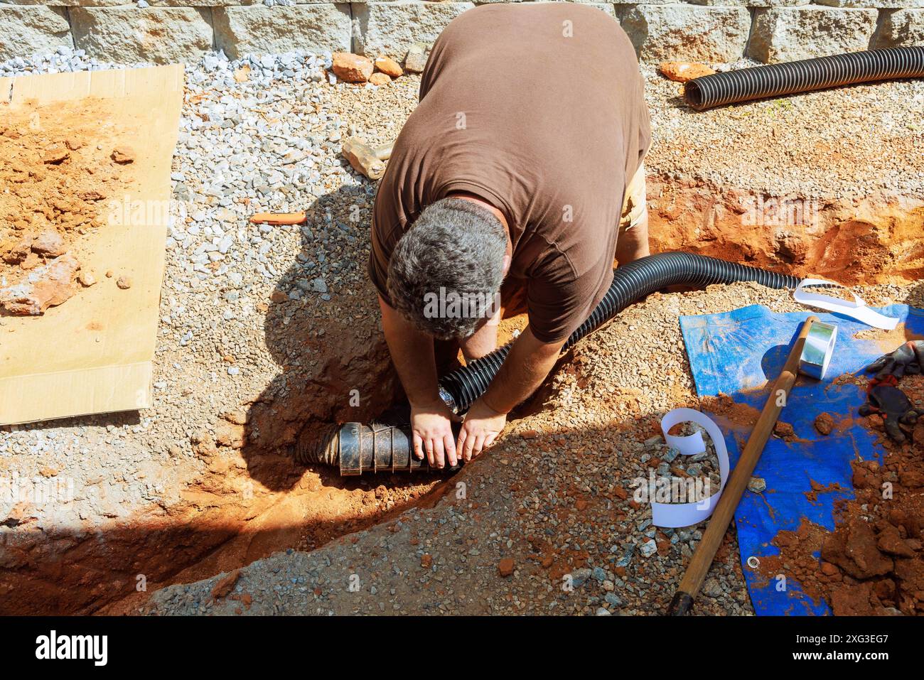 Using perforated flexible pipes to drain rainwater at trench Stock ...