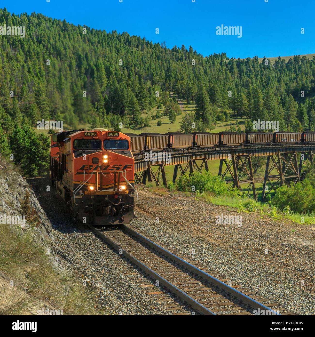 coal train heading to mullan pass on the continental divide over a ...