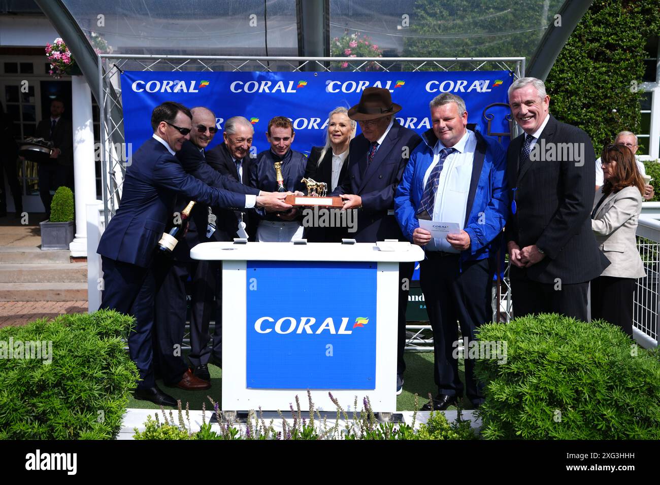Jockey Ryan Moore (centre) and trainer Aidan O'Brien (left) celebrate ...