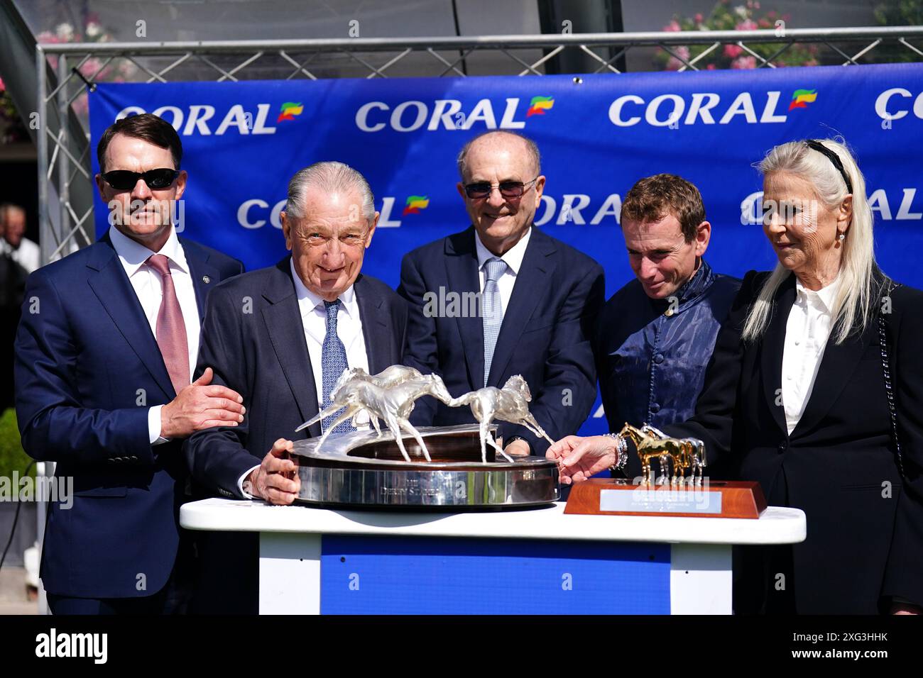 Jockey Ryan Moore (second right) and trainer Aidan O'Brien (left ...