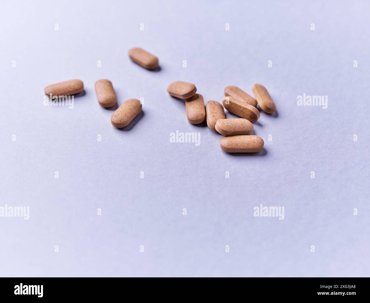 Ashwagandha (Withania somnifera) tablets. Bright background. Soft focus ...