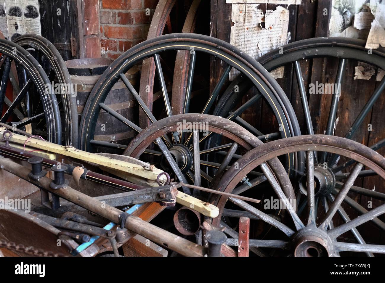 Carriage and wagon wheels in workshop. 1920 Stock Photo - Alamy