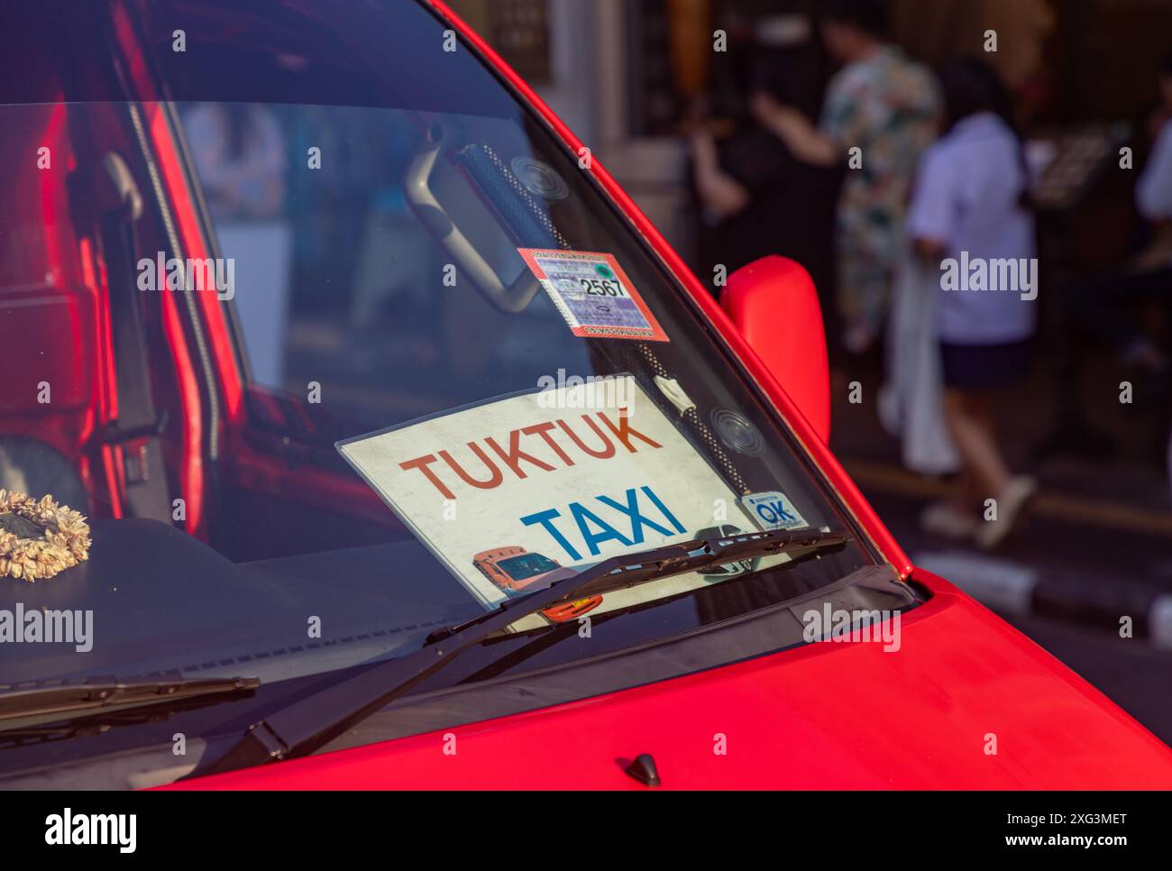 A close-up picture of the tuk tuk taxi sign Stock Photo - Alamy