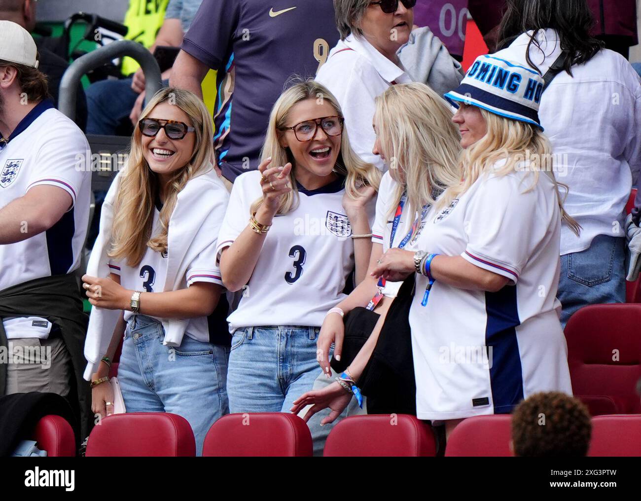 Izzy Parish (left) and Jessica Parish (centre) in the stands before the ...