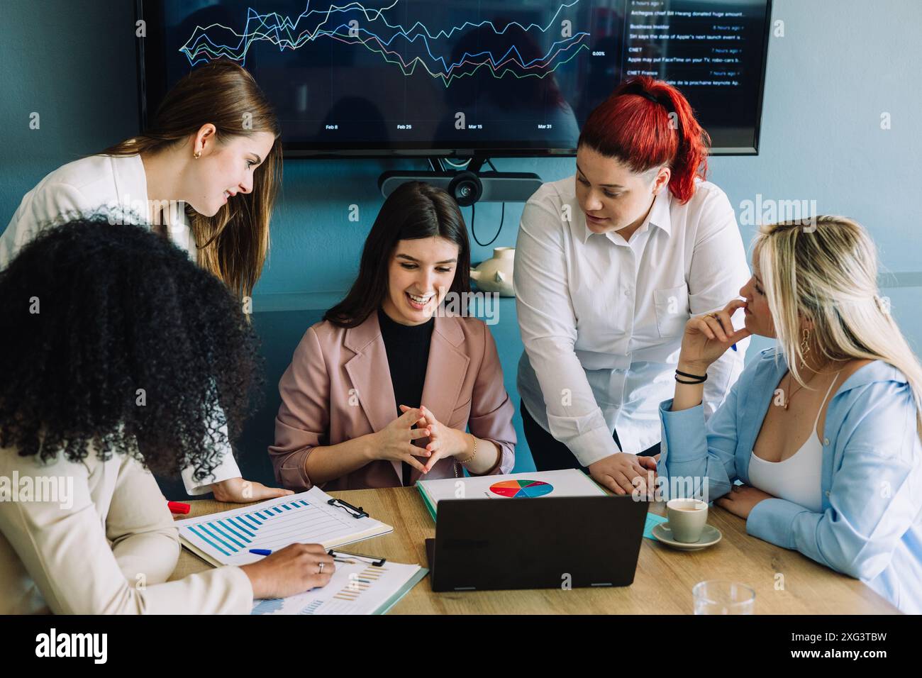 Young students learning economy and finances on college project. Group ...