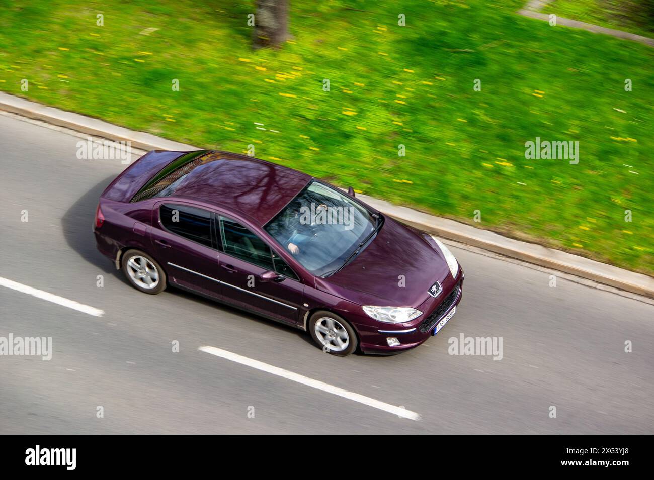 OSTRAVA, CZECH REPUBLIC - APRIL 4, 2024: Purple French Peugeot 407 ...