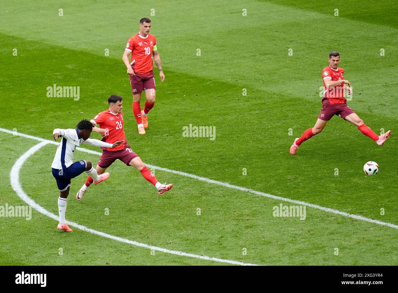 England's Kobbie Mainoo (left) attempts a shot on goal during the UEFA ...