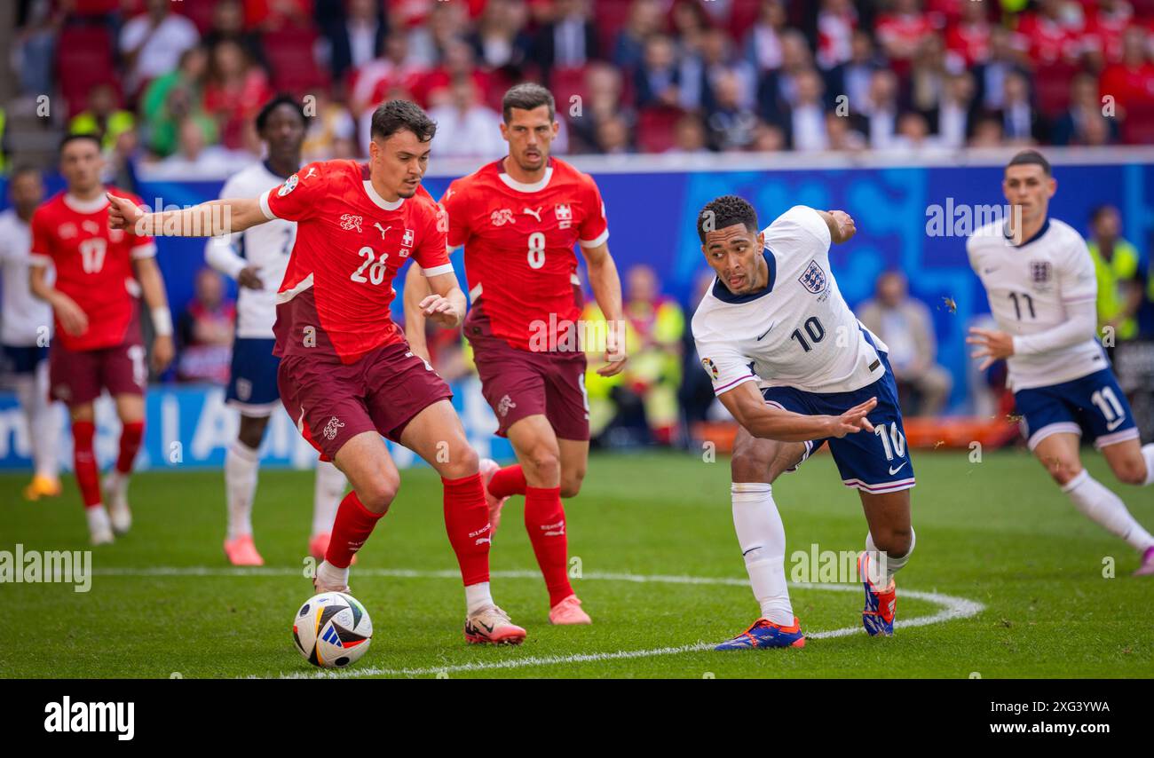 Dusseldorf, Germany. 06th Jul 2024. Fabian Rieder (SUI) Jude Bellingham ...