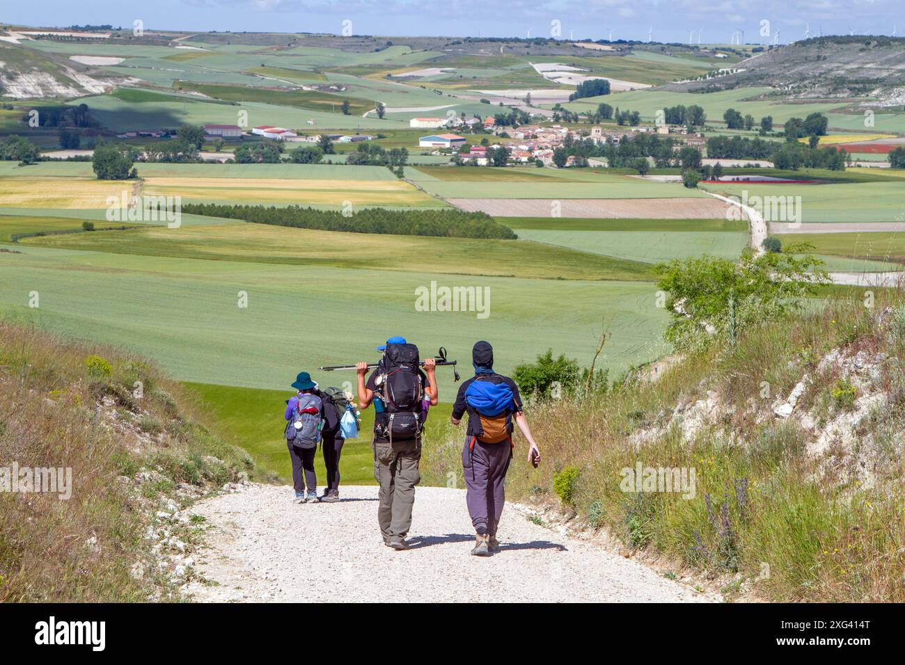 Pilgrims walking the Camino de Santiago the way of St James pilgrimage ...