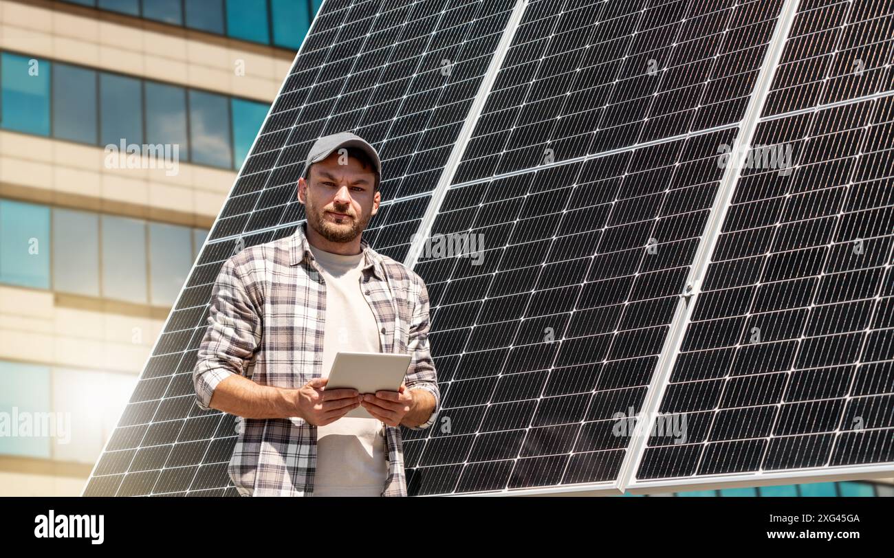 Portrait of a male solar panel maintenance specialist. Solar energy ...