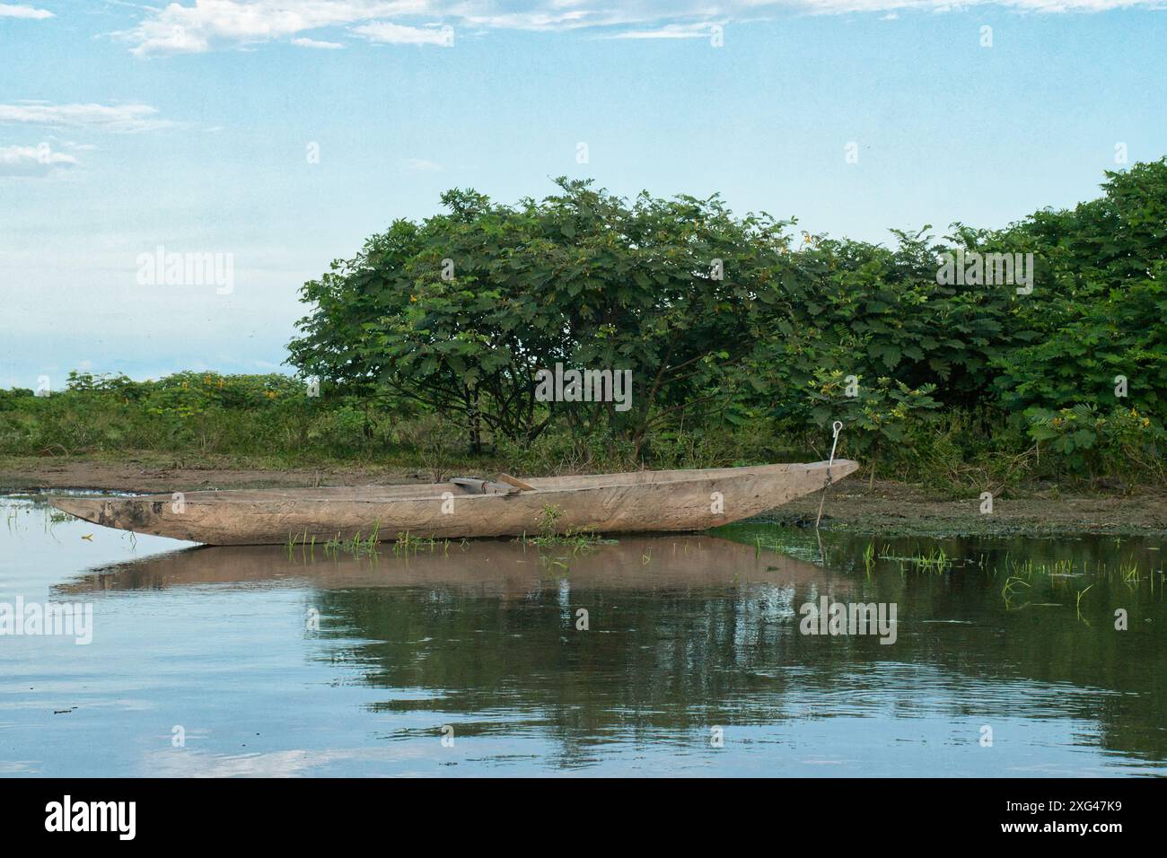 Wooden Boat by the Lake: Tranquil Scene of Indigenous Craft in Nature ...