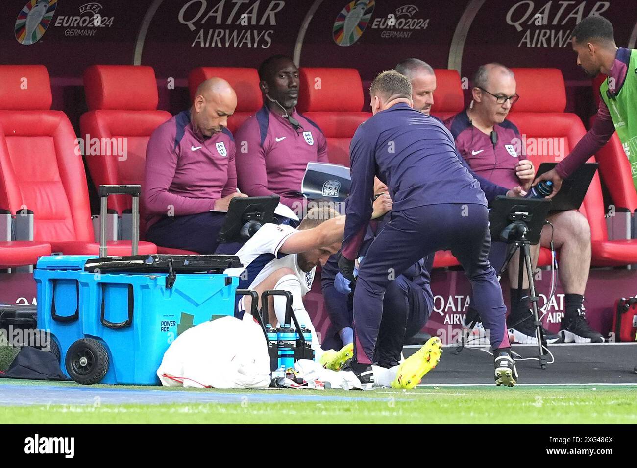 England's Harry Kane is helped up after colliding into the England ...