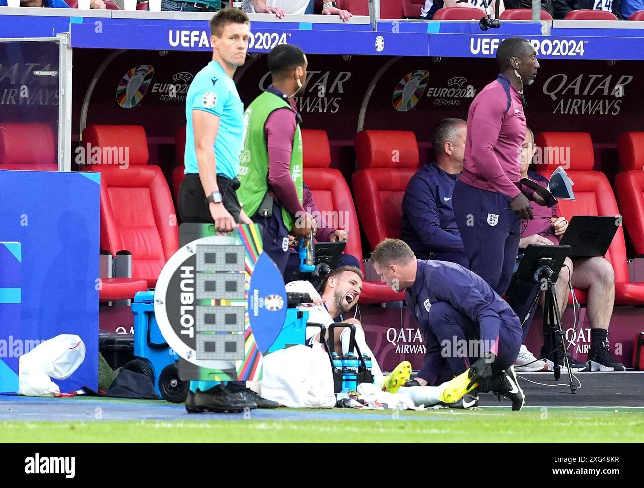 England's Harry Kane receives treatment after colliding into the ...