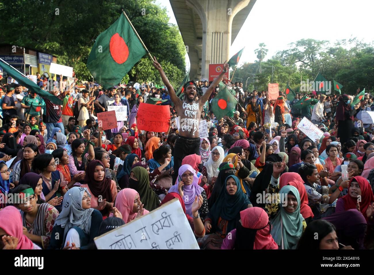 Bangladeshi students block the Shahbagh intersection, during a protest ...