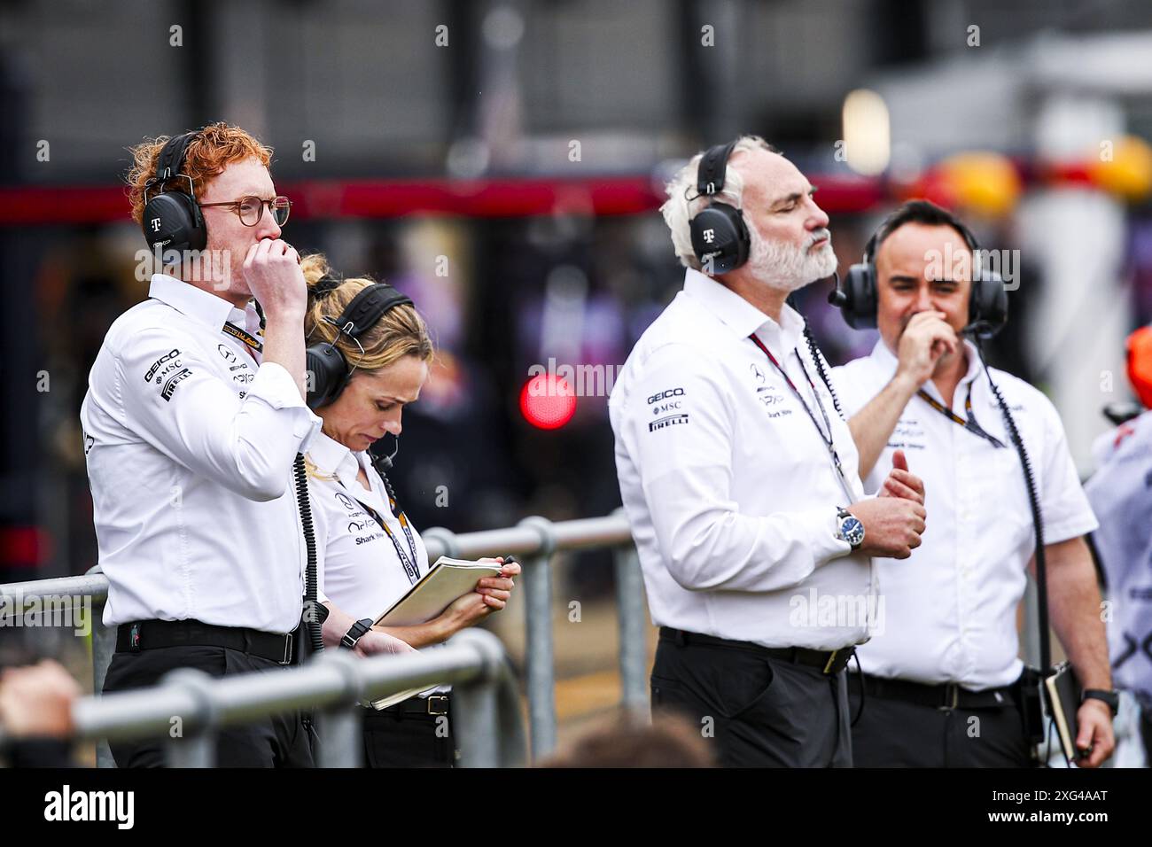 APX GP Team crew filming in the paddock for the Apex F1 movie by Apple ...
